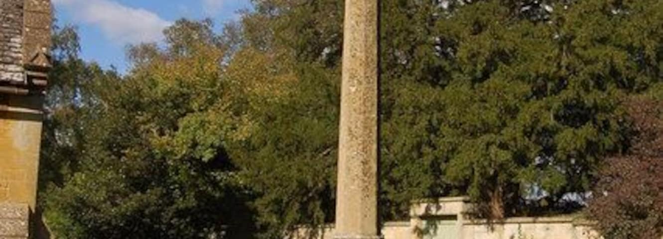 War memorial in St Michael and All Angels churchyard, Stanton, Gloucestershire