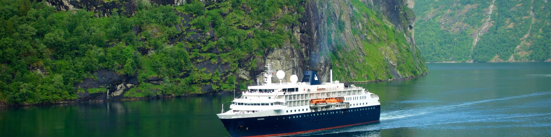 Geiranger which includes a gorge or canyon, a river or creek and cruising