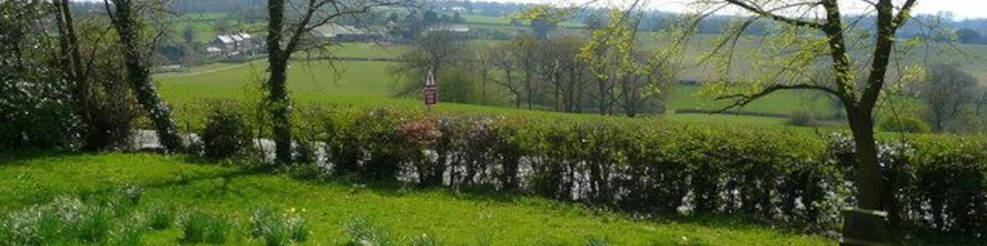 View from St. Leonard's From the vantage point on a hilltop in the weald of Sussex. The B2110 passes across the scene.