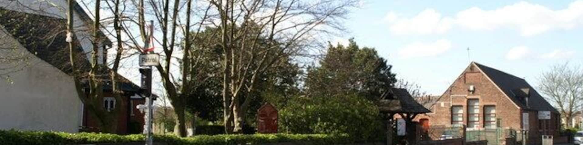 St James' Parish Centre (right) and part of the parish church (left), Church Road, Haydock, Merseyside, seen from the northeast
