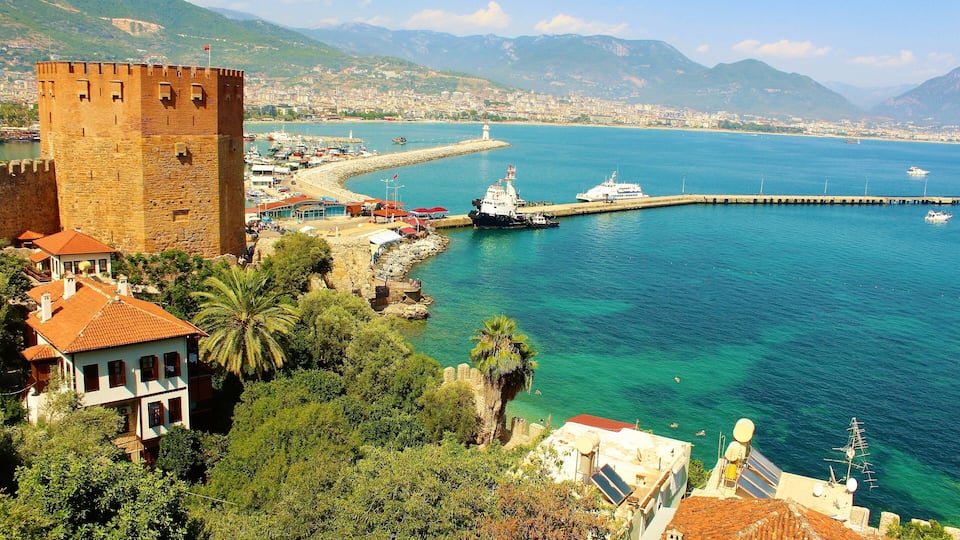 The Kızıl Kule (Red Tower) is a 13th-century tower in the Turkish city of Alanya. Part of Alanya Castle, the tower is considered to be the symbol of the city. And it's definitely one of the most impressive sights in Alanya :).
And more about the Red Tower: Being one of the unique examples of the medieval Mediterranean defense structure from 13th century, Red Tower was built by order of Alaeddin Keyqubad I, the Seljuk ruler, to Ebu Ali Reha el Kettani who was a master builder from Aleppo in order to protect harbor, shipyard and Alanya Castle against attacks from the sea. And the castle was built on the remnants of earlier Byzantine era and Roman era fortifications.