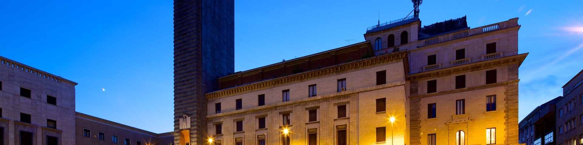 Varese which includes a square or plaza, night scenes and street scenes