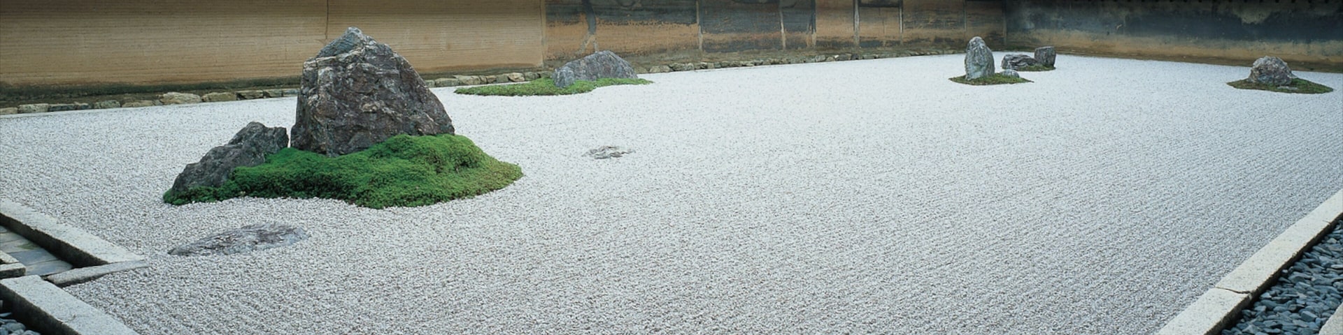 Ryoanji Temple showing a temple or place of worship and religious elements