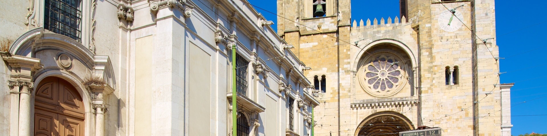 Lisbon Cathedral showing a church or cathedral, heritage architecture and a city