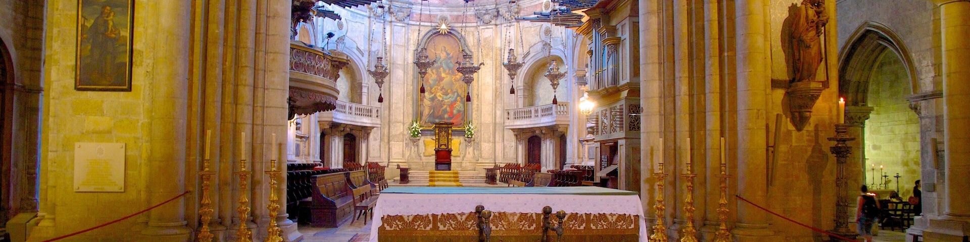 Lisbon Cathedral showing a church or cathedral, heritage architecture and religious aspects