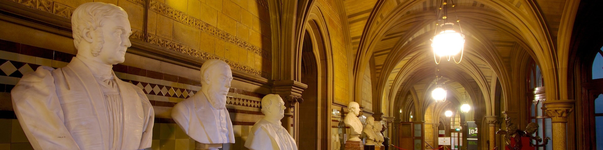 Manchester City Hall which includes interior views, a statue or sculpture and heritage architecture