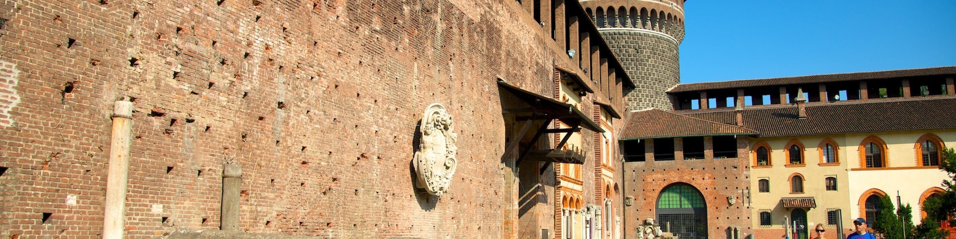 Castello Sforzesco showing heritage elements and chateau or palace as well as a small group of people