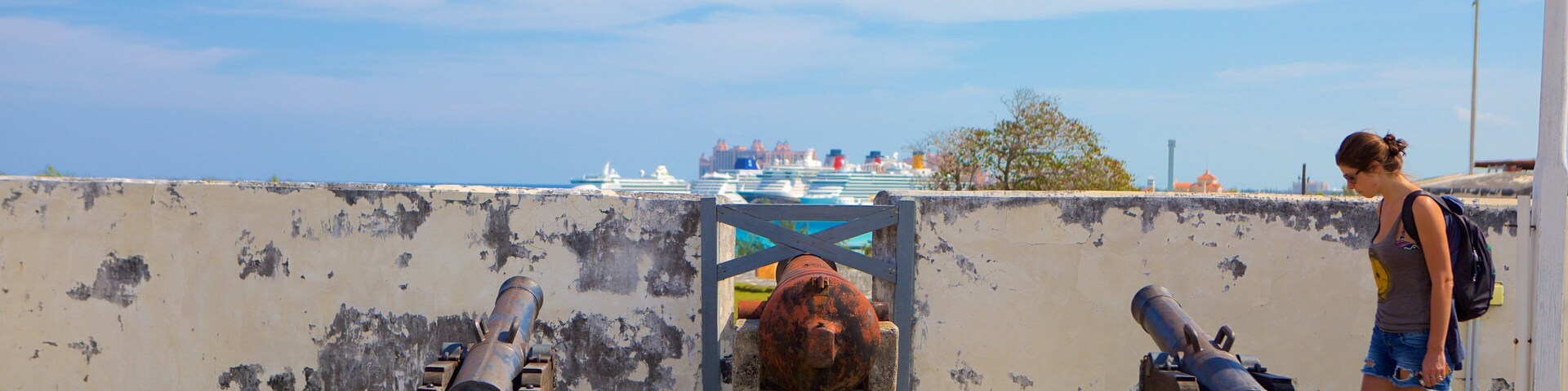 Fort Charlotte featuring heritage elements as well as an individual femail