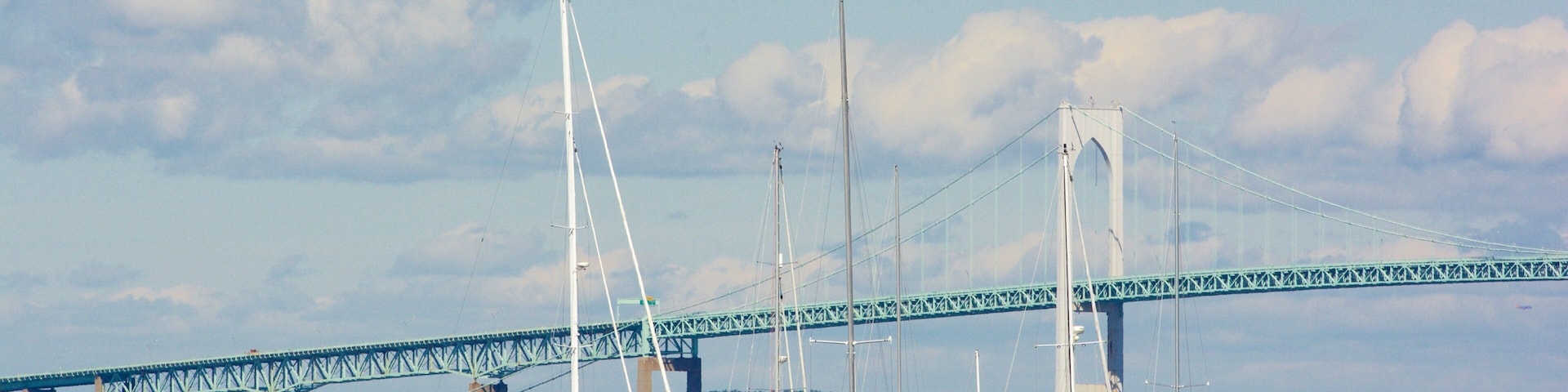 Fort Adams State Park which includes a bridge and a bay or harbor