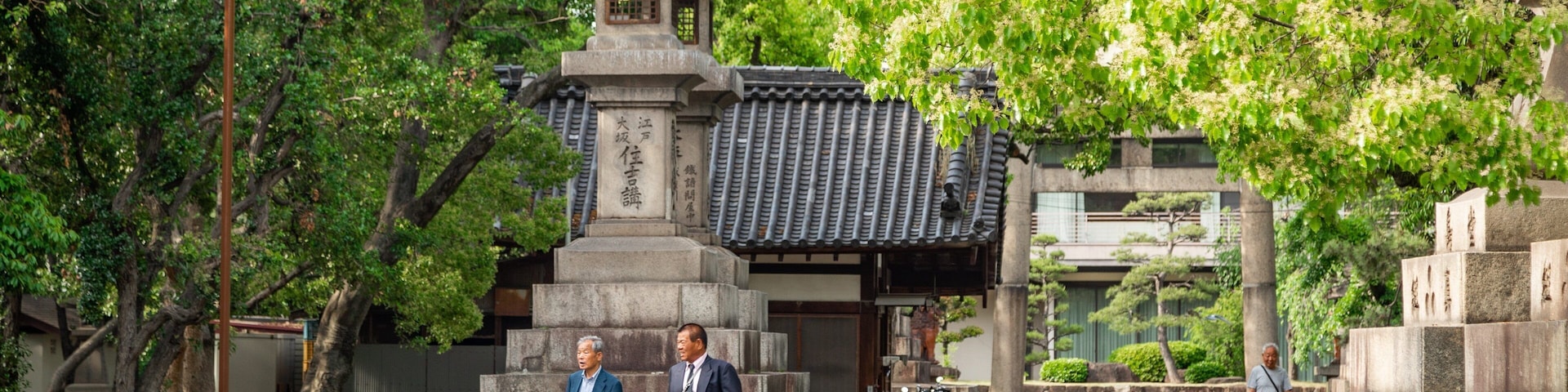 Sumiyoshi Taisha Shrine featuring heritage elements and street scenes as well as a couple