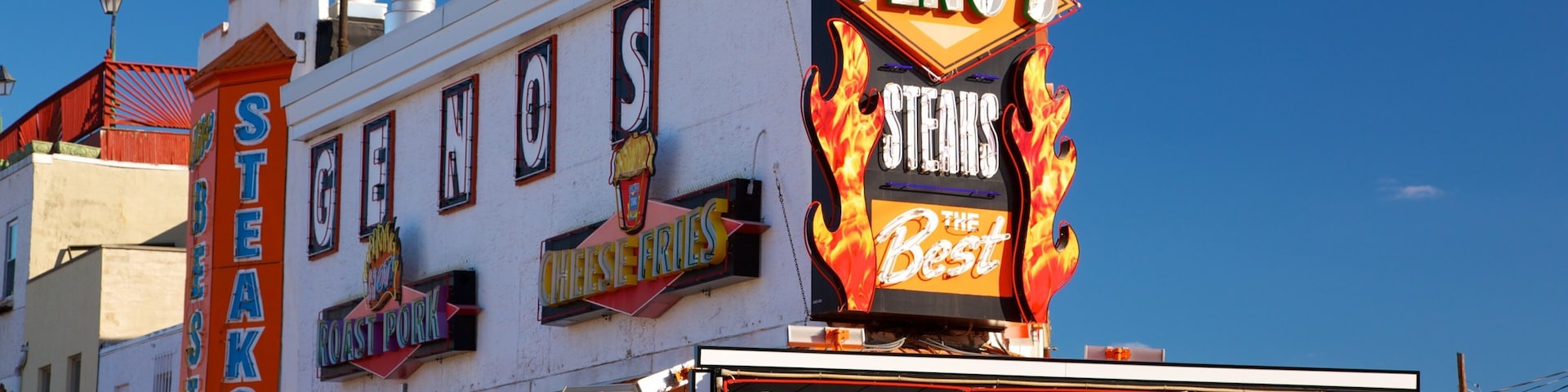 Italian Market mostrando uma cidade, sinalização e mercados