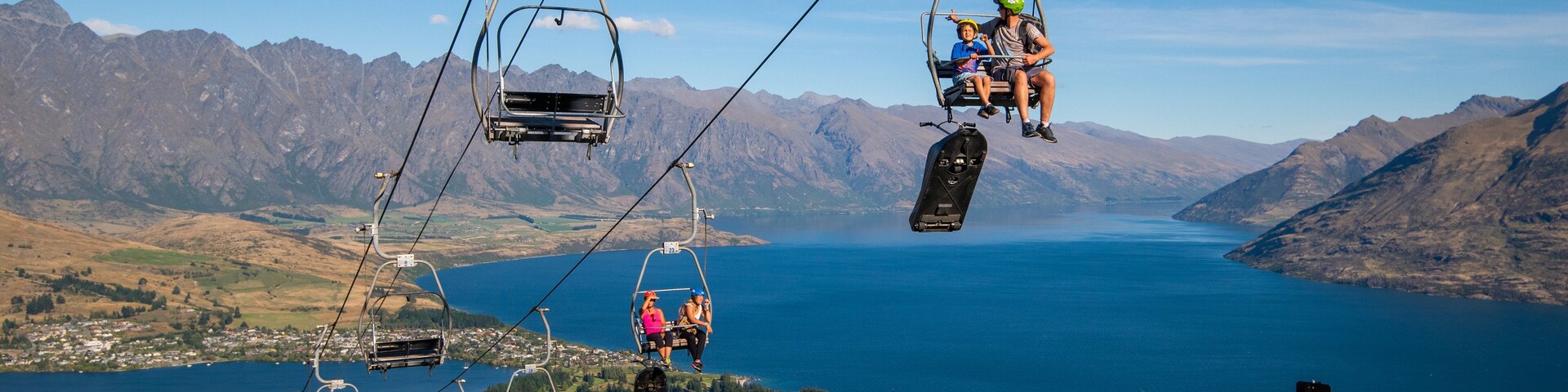 Skyline Queenstown which includes landscape views, a gondola and a lake or waterhole