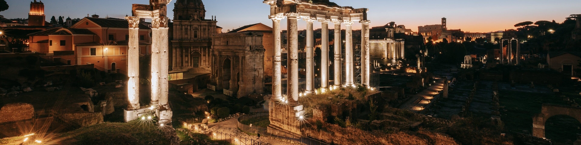 Roman Forum featuring heritage architecture, a monument and night scenes