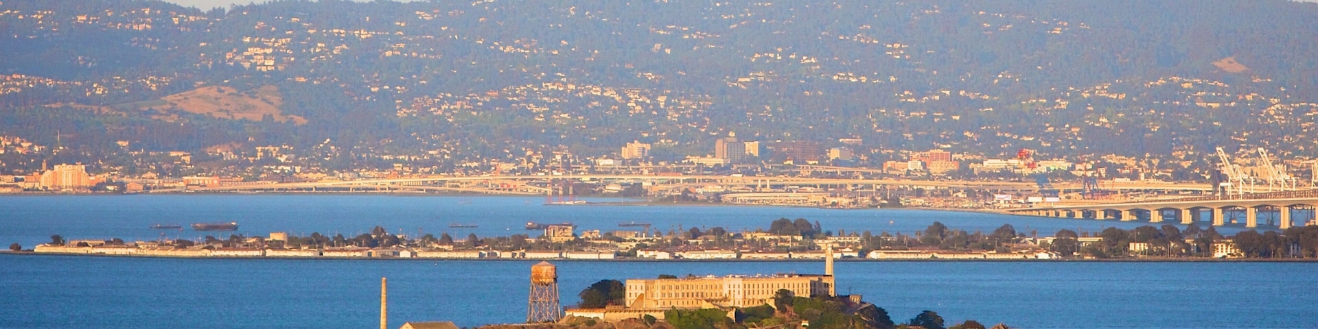 Alcatraz Island showing a coastal town and island images