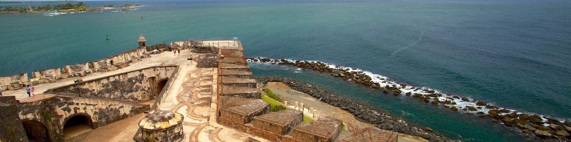 El Morro featuring heritage elements and rugged coastline