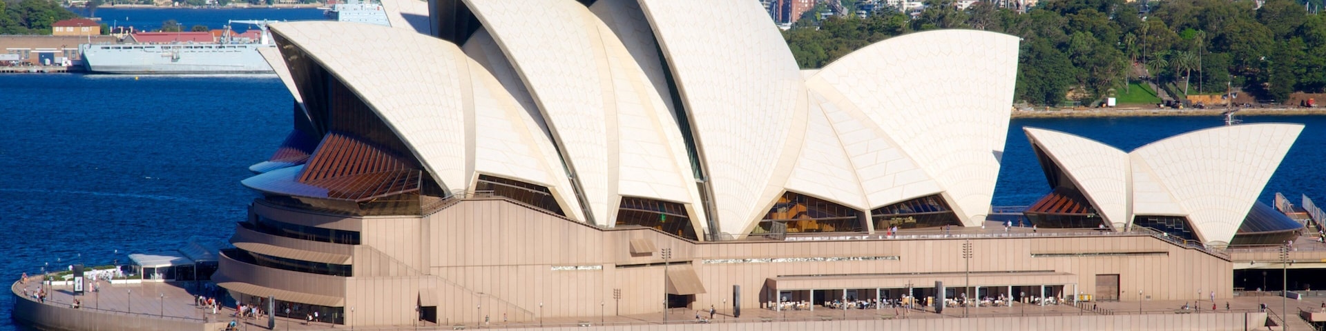 Sydney Opera House featuring a city, a bay or harbor and boating