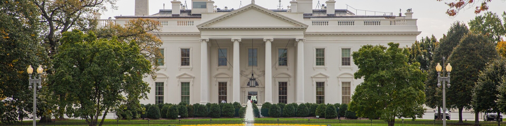White House which includes heritage architecture and an administrative buidling as well as a large group of people