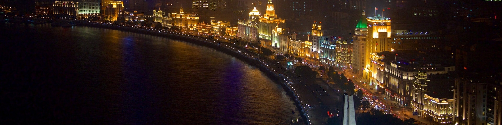The Bund showing a river or creek, night scenes and a city