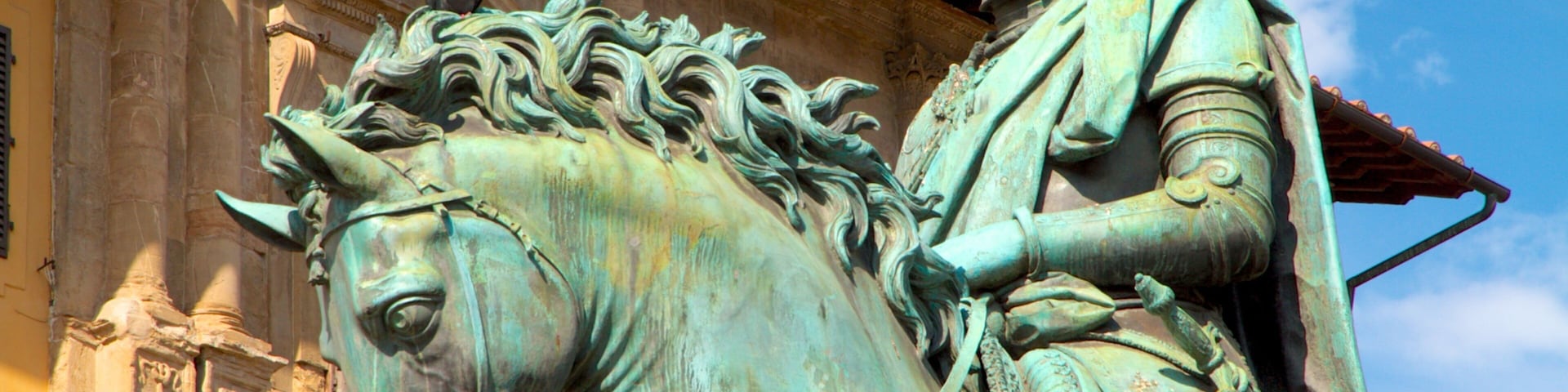Piazza della Signoria showing a city, art and a statue or sculpture