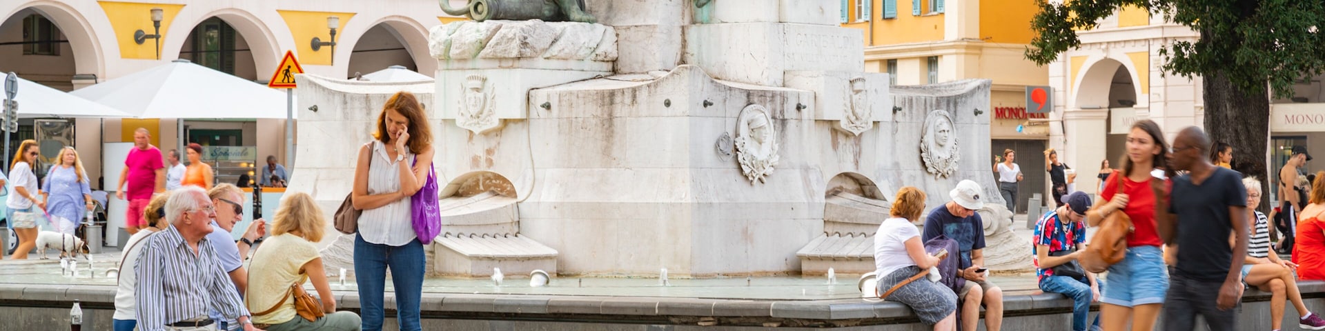 Place Garibaldi which includes street scenes and a fountain as well as a small group of people