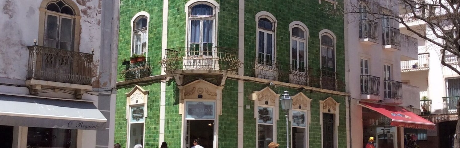 A fantastic house covered in green ceramic tiles in Lagos, Portugal. The colour of the green is amazing on a hot sunny day here.