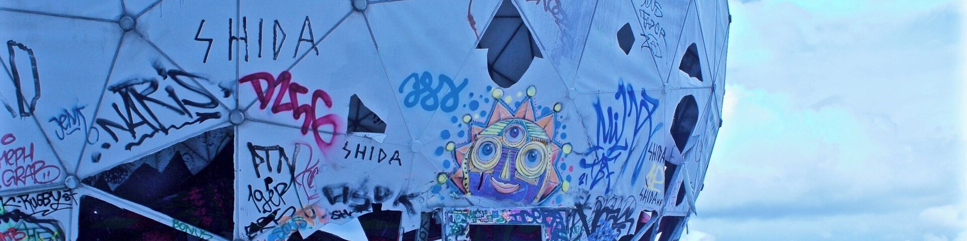 Teufelsberg tower is a former US spy station set in former West Berlin. It is a bit less than a 2 mile hike from the S Bahn station that leaves you near the entrance of Grunewald Park. This park is full of beautiful hikes, as well as a lake for free swimming. The highlight, however, is definitely Teufelsberg tower. It is now abandoned, but has been overtaken by artists. For 7 euro, you can have an hour tour of all the graffiti art.