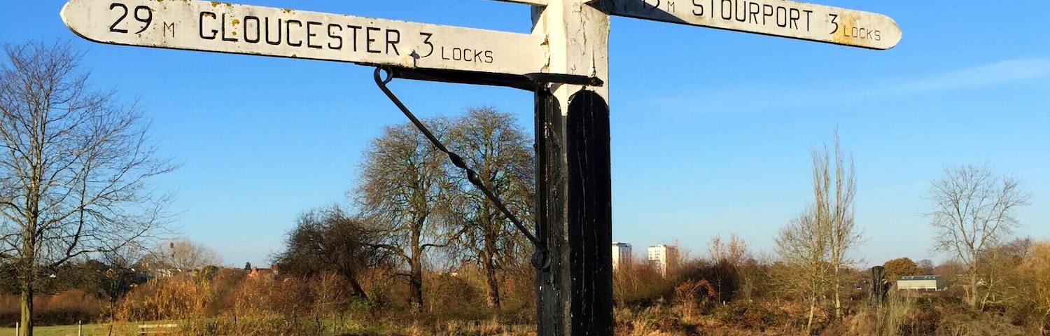 The canal signpost at the start of the Worcester and Birmingham Canal on the River Severn. Only 58 locks uphill to Birmingham!