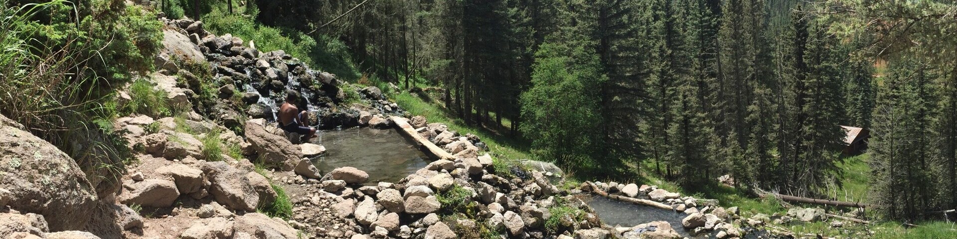San Antonio springs consist of five springs that capture natural spring water cascading down the mountain. The pools are progressively cooler as you go down, and they are worth the hike down a 6-mile dirt road when the Forest Service locks the main gates, which is almost always.