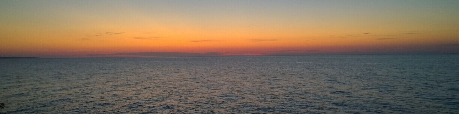 The view looking out over Lake Erie just after sunset from Lakewood Park.