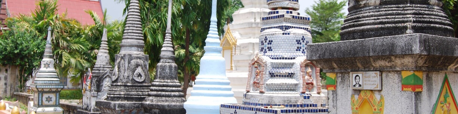 Behind the Wat Na Phramen temple are some beautiful buildings and a large number of small stupas like these in the photograph.