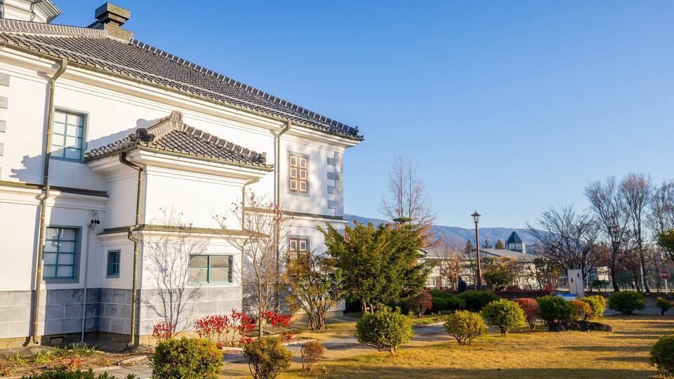 Kaichi School Museum showing heritage elements and a garden