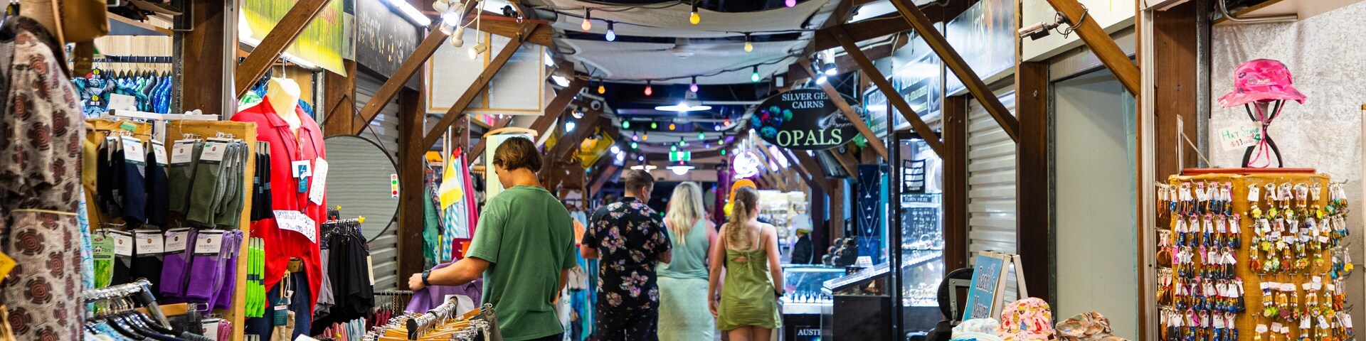 Cairns Night Markets showing markets as well as a small group of people