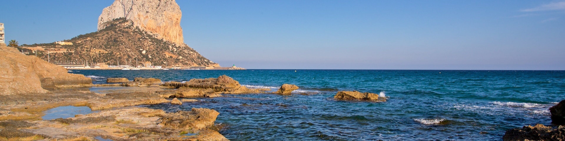 Banos de la Reina Archaelogical Site showing rugged coastline and general coastal views