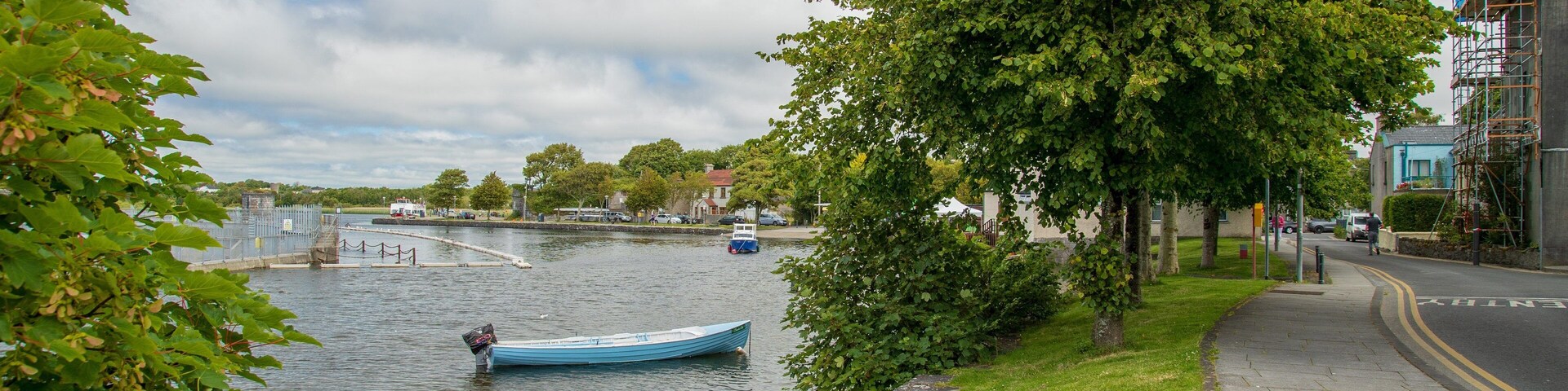 Riverside Walk which includes a bay or harbor