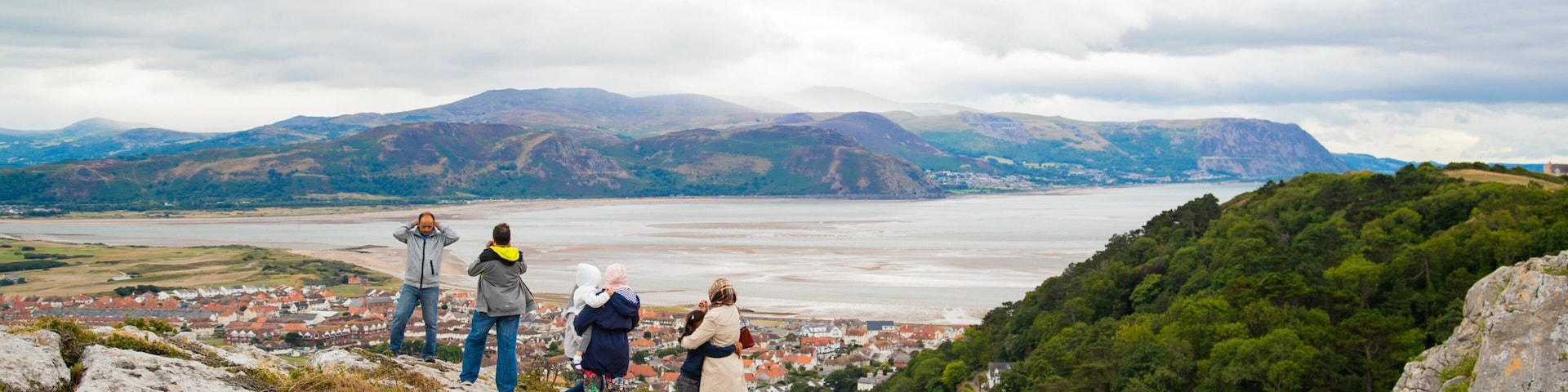 Pen-y-Dinas Hillfort which includes views, a coastal town and general coastal views