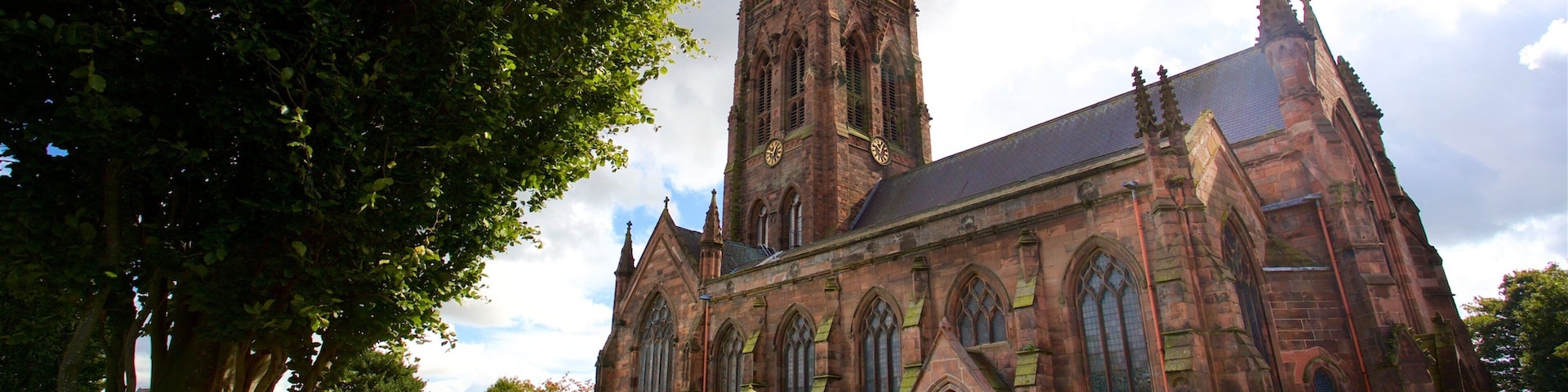 Warrington Parish Church featuring a church or cathedral and heritage architecture