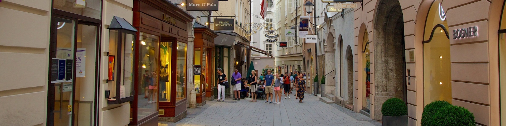 Salzburg featuring signage, a city and street scenes