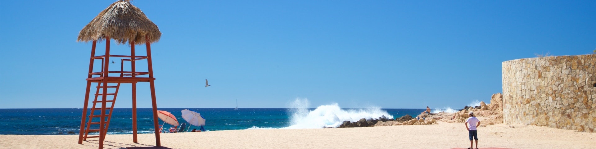 Playa Las Viudas which includes a sandy beach and general coastal views as well as an individual male