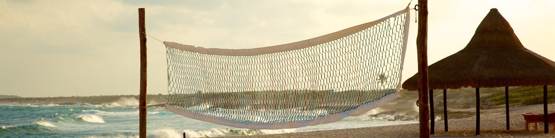 Punta Morena which includes a beach, a sunset and general coastal views