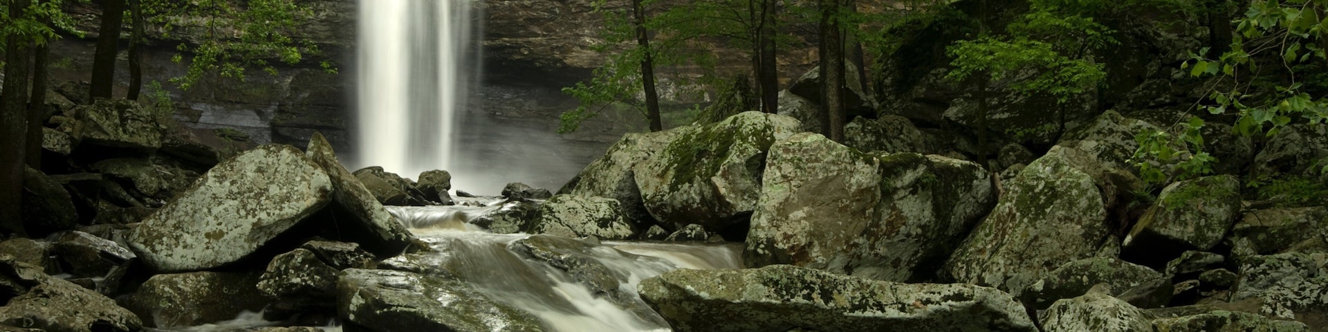 Little Rock - Central Arkansas showing a river or creek and a waterfall