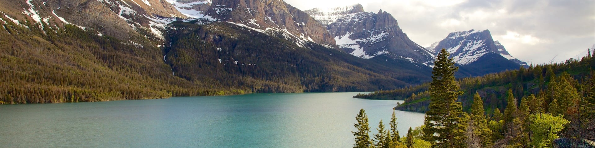 St. Mary Lake featuring landscape views, a river or creek and tranquil scenes