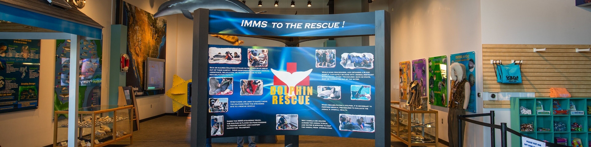 Institute for Marine Mammal Studies showing signage and interior views