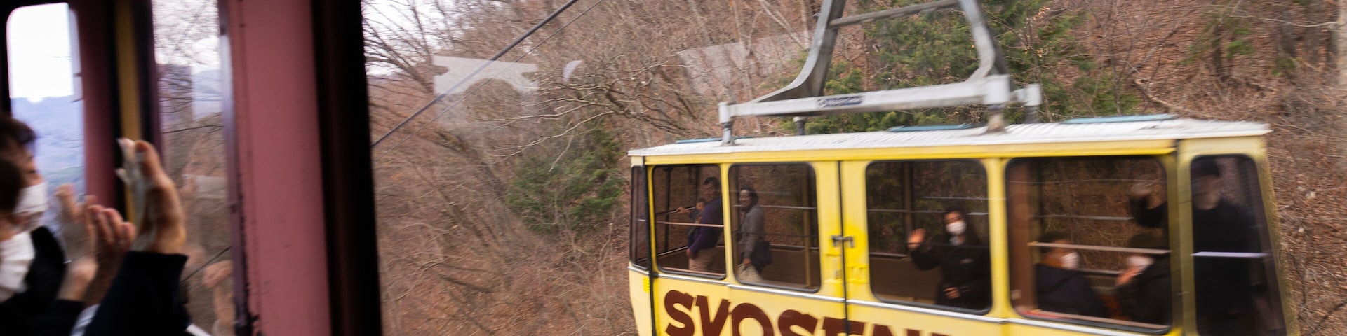 Shosenkyo Ropeway which includes a gondola and signage