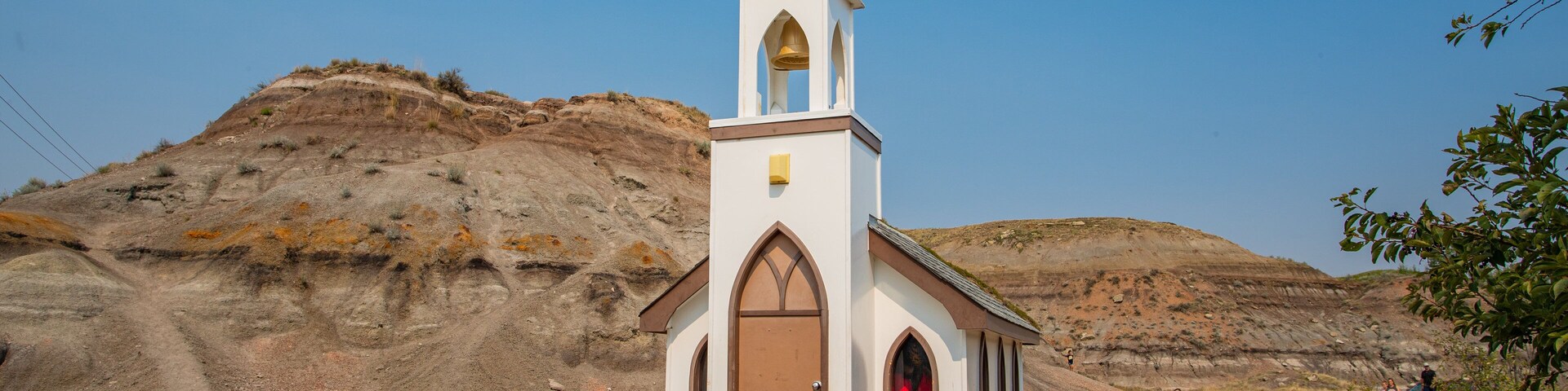 Drumheller\'s Little Church featuring farmland and a church or cathedral