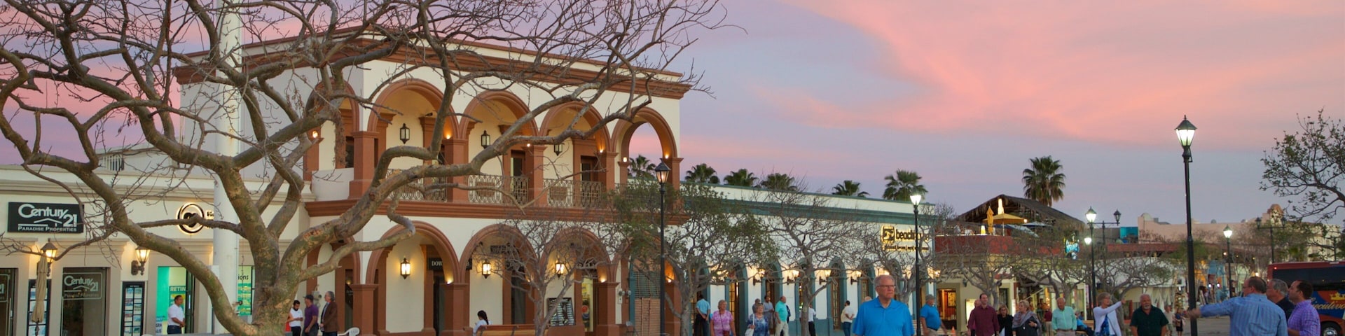 Plaza Mijares which includes a sunset and a square or plaza