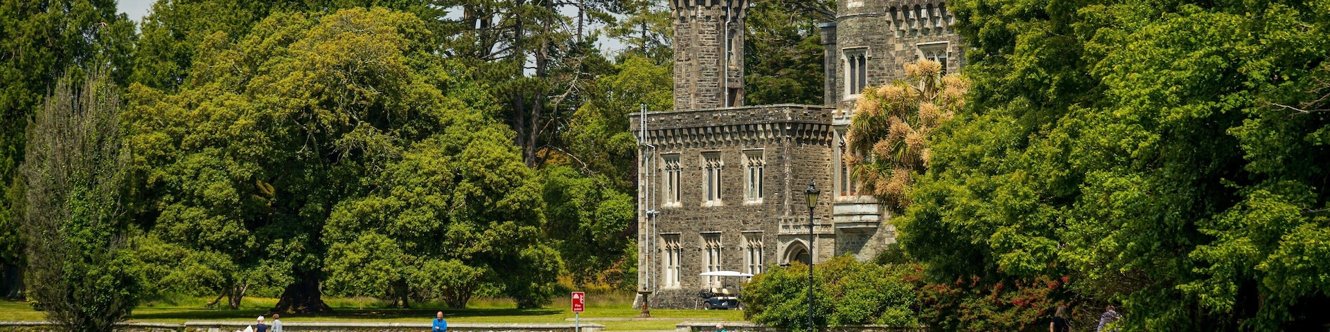 Johnstown Castle & Gardens which includes a lake or waterhole, heritage architecture and a castle