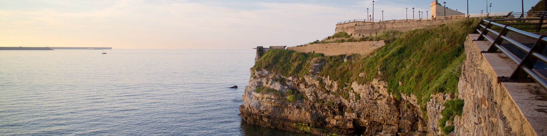 Cerro Santa Catalina Park which includes general coastal views, a sunset and rugged coastline