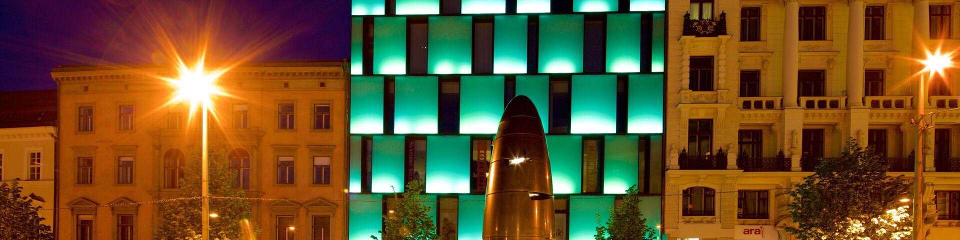 Náměstí Svobody featuring a square or plaza, a statue or sculpture and a city