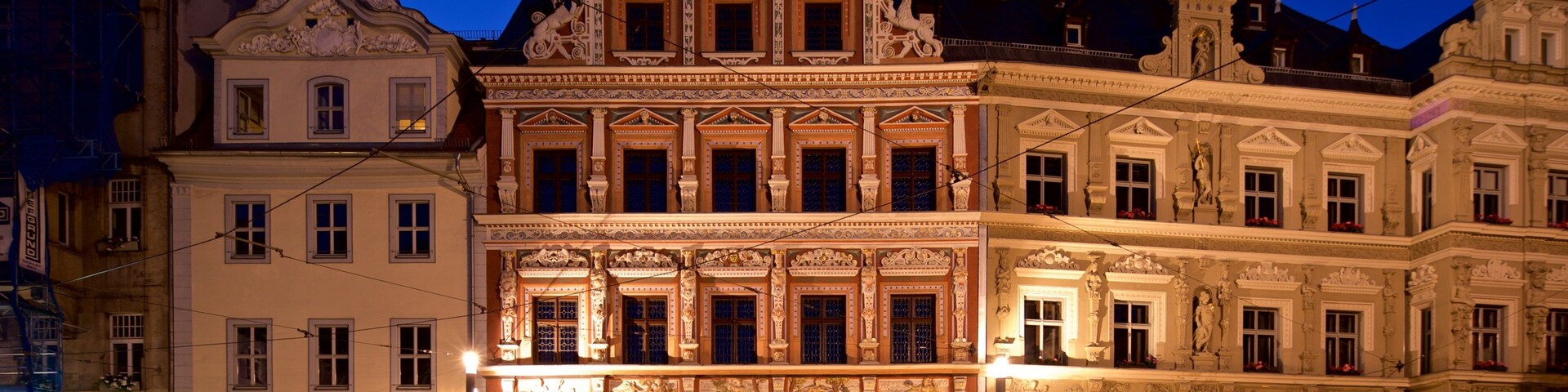 Gildehaus mostrando elementos de patrimônio e cenas noturnas