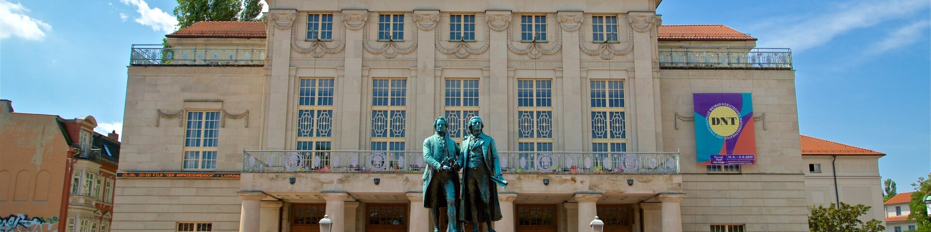 Goethe-Schiller Monument which includes a square or plaza, a statue or sculpture and heritage architecture